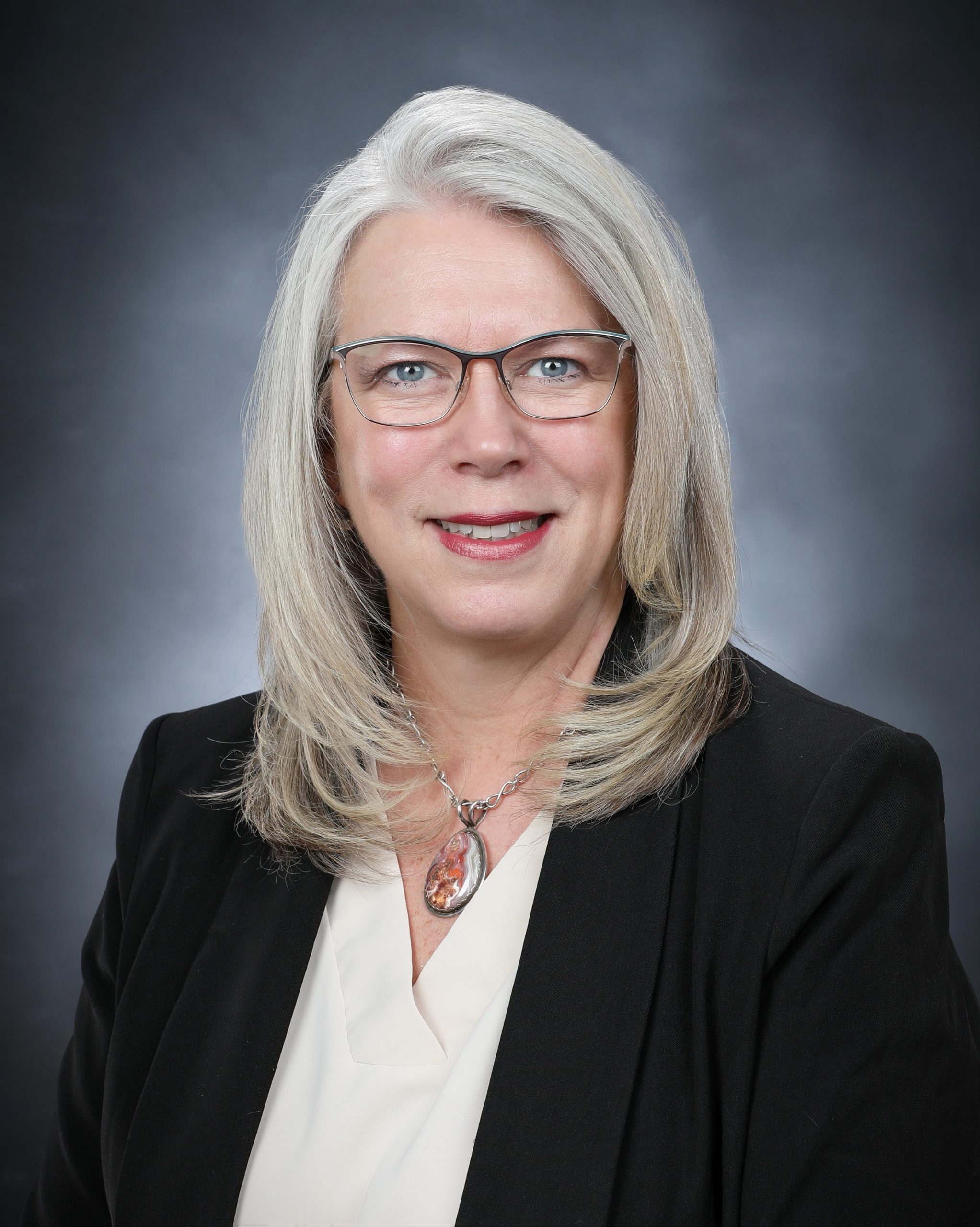 Debra Sandbrook's Bio - Timeless Hearing